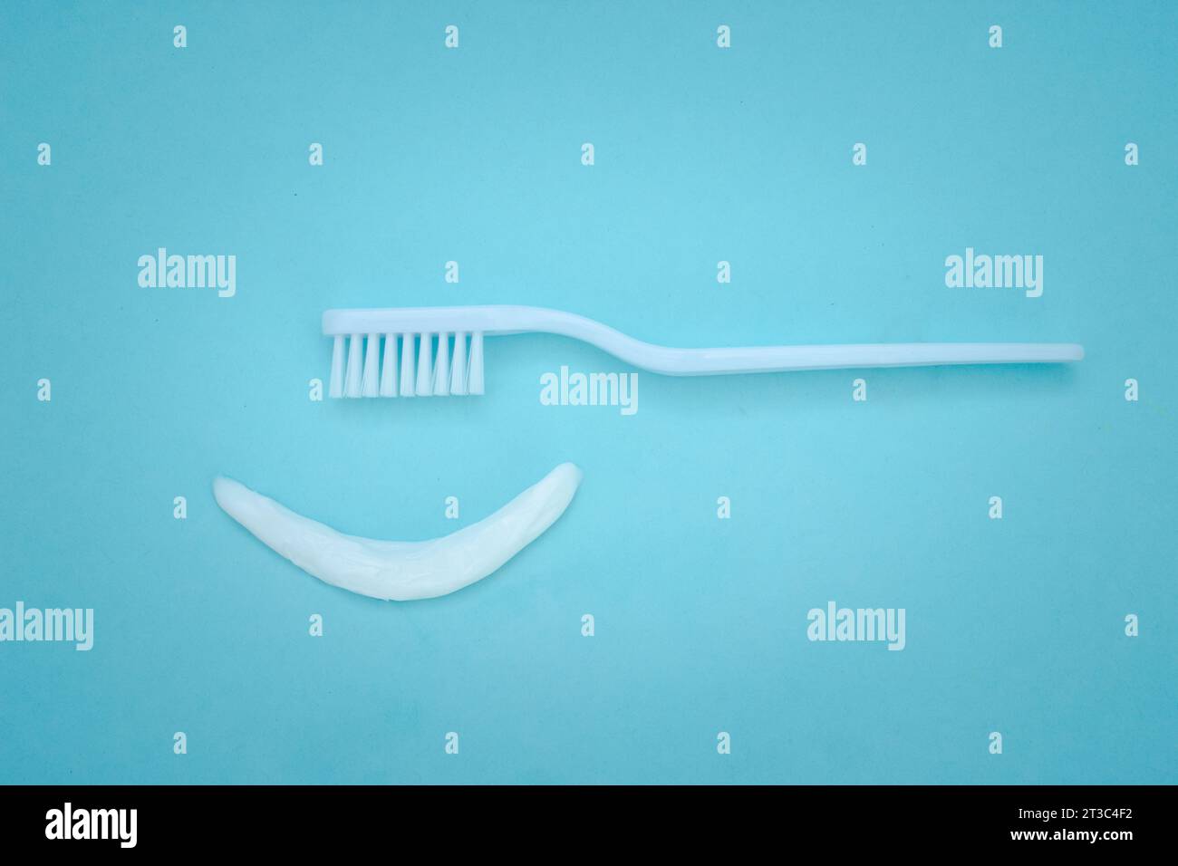Smiley face created from paste with white Toothbrush. Happy for healthy ...