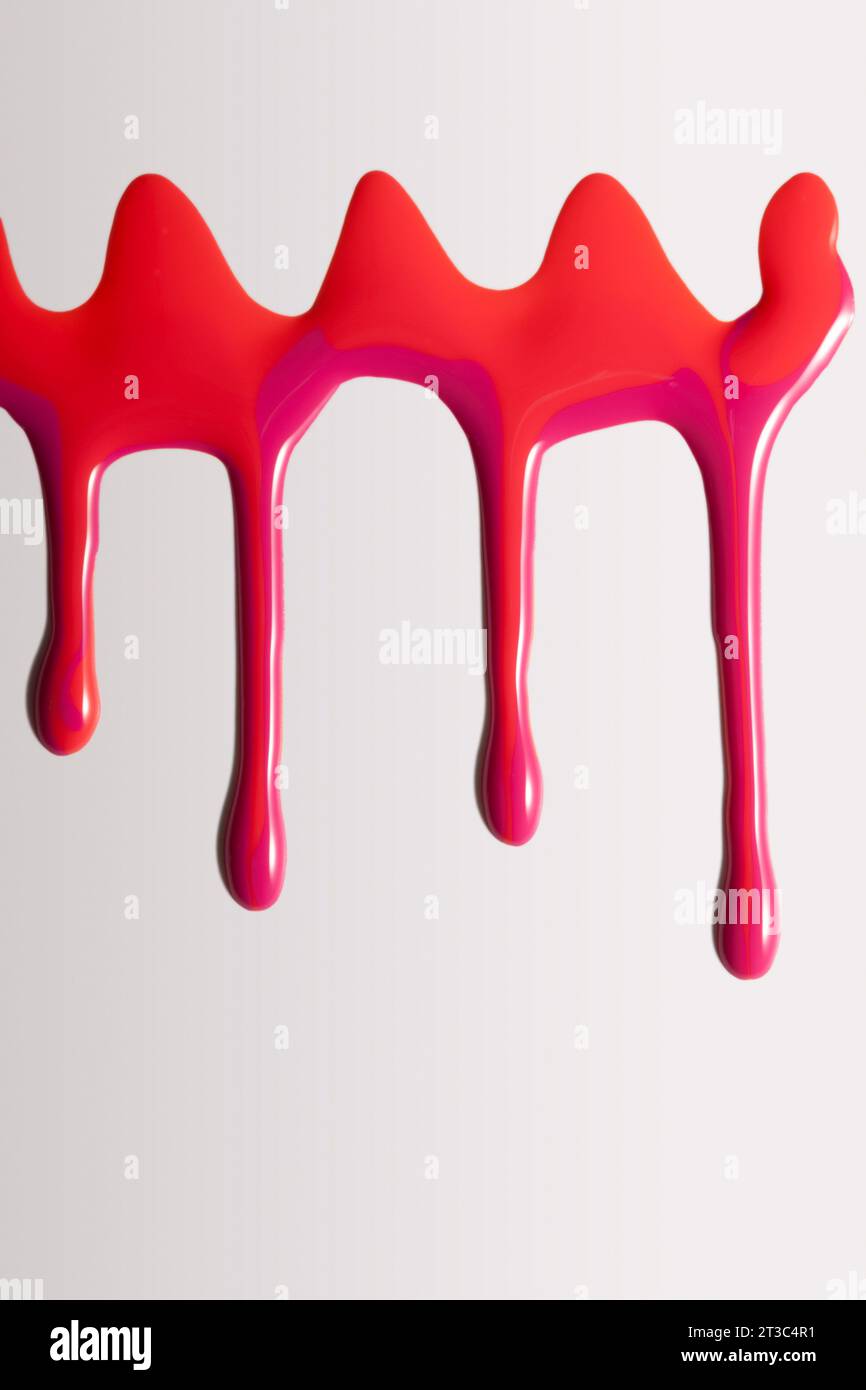 Dripping red nail polish on white wall Stock Photo - Alamy
