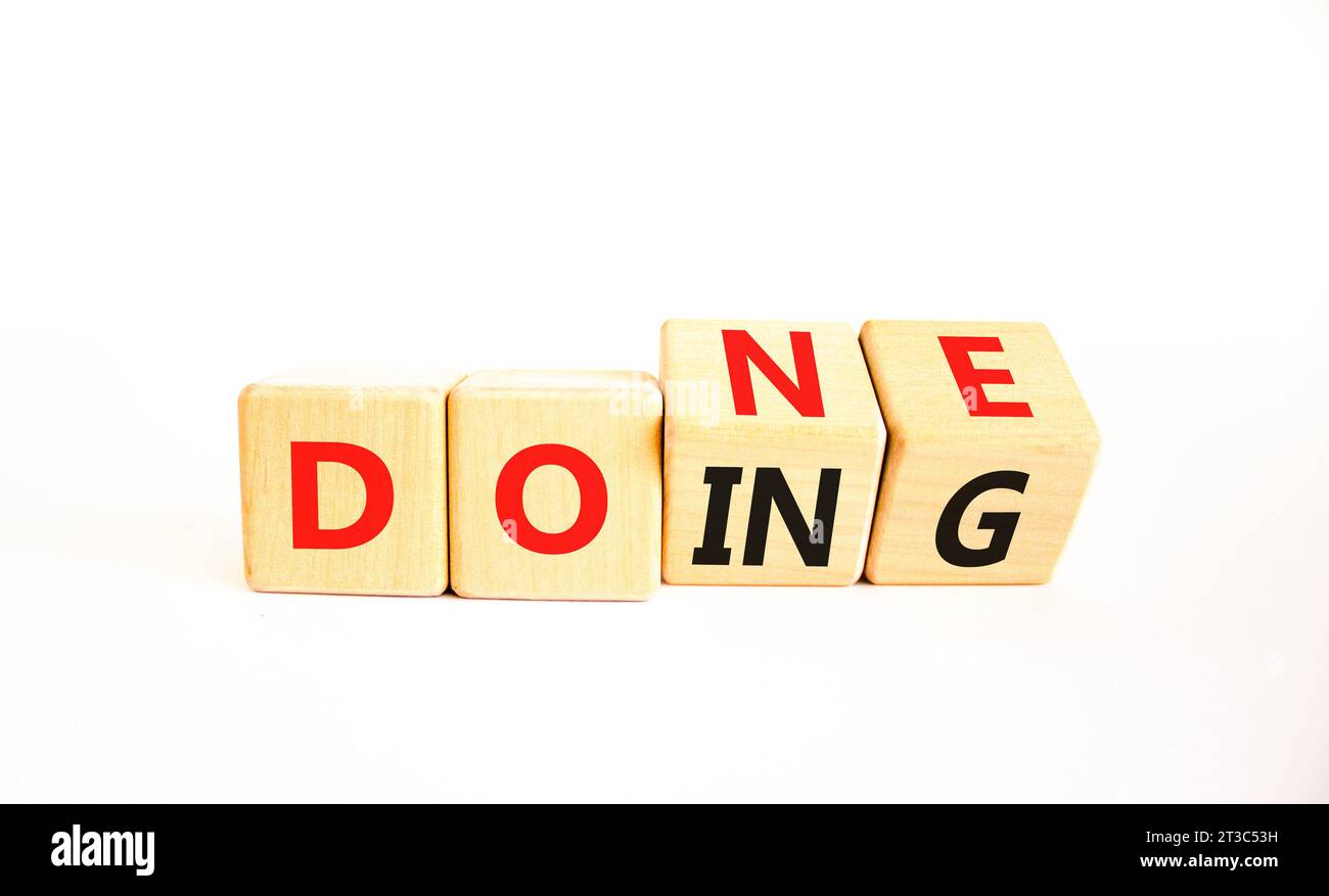 Doing and done symbol. Concept words Doing Done on wooden block ...