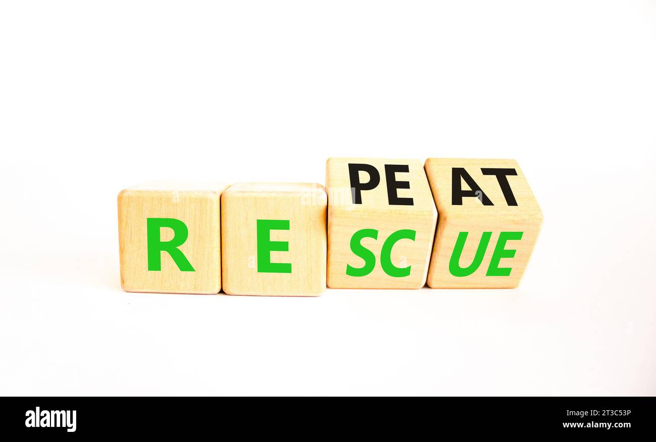 Rescue and repeat symbol. Concept words Rescue Repeat on wooden block ...