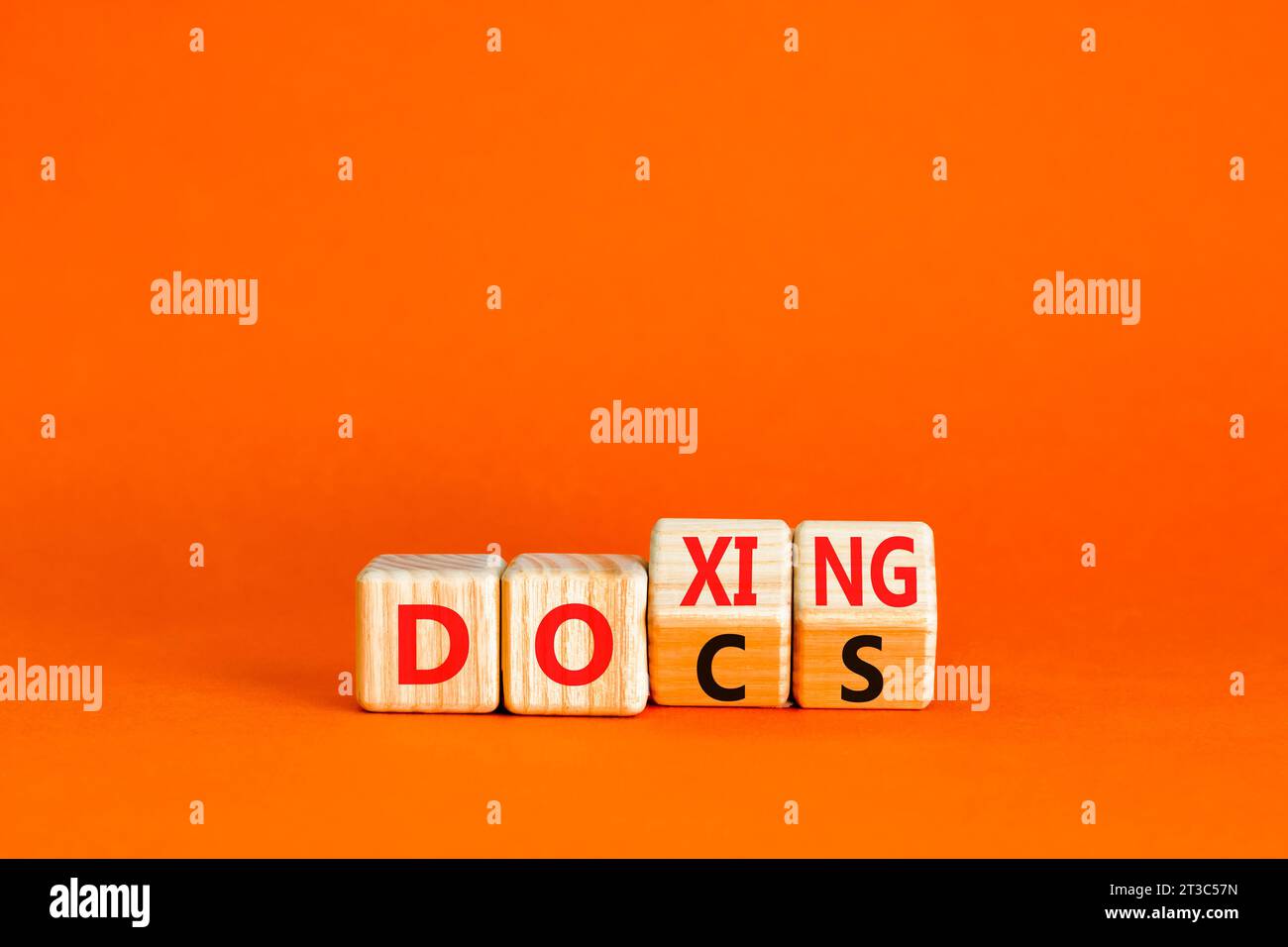 Docs or doxing symbol. Concept words Docs Doxing on wooden block ...