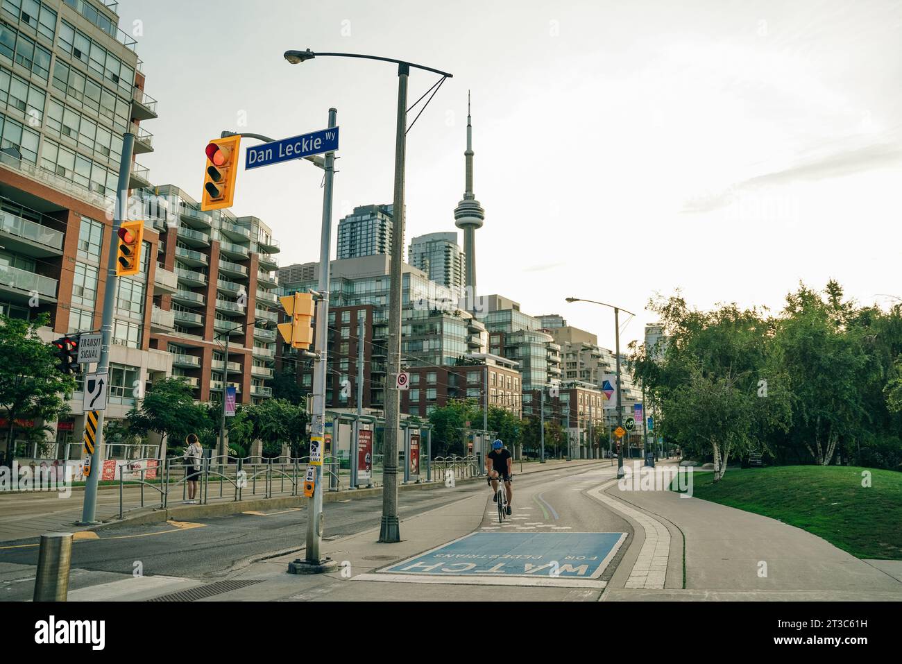 TORONTO, CANADA - October 4, 2023 Green bike lane on a busy street in ...