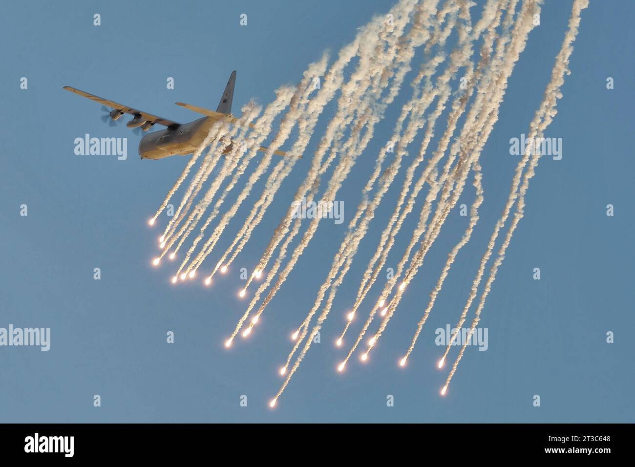 An Israeli Air Force C-130J Shimshon releasing flares Stock Photo - Alamy