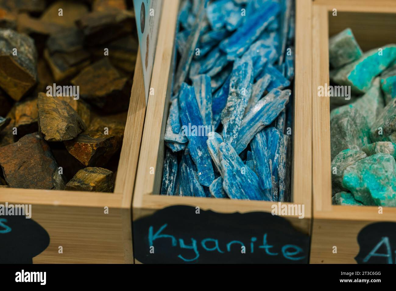 A wooden box with three smaller boxes inside, each containing chips of ...