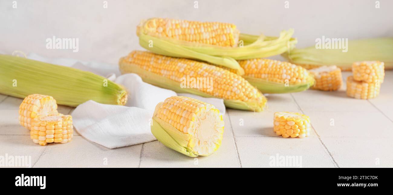 Fresh corn cobs on light table. Banner for design Stock Photo - Alamy