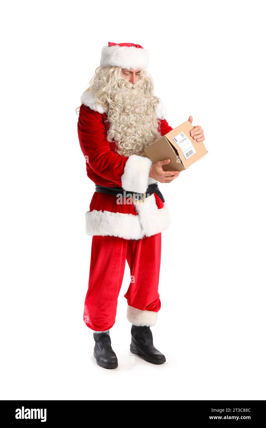 Santa Claus with parcel isolated on white background Stock Photo - Alamy