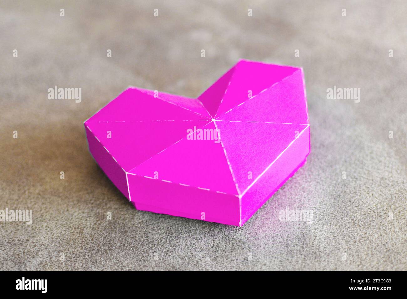 Magenta cardboard heart shaped box, paper craft Stock Photo - Alamy