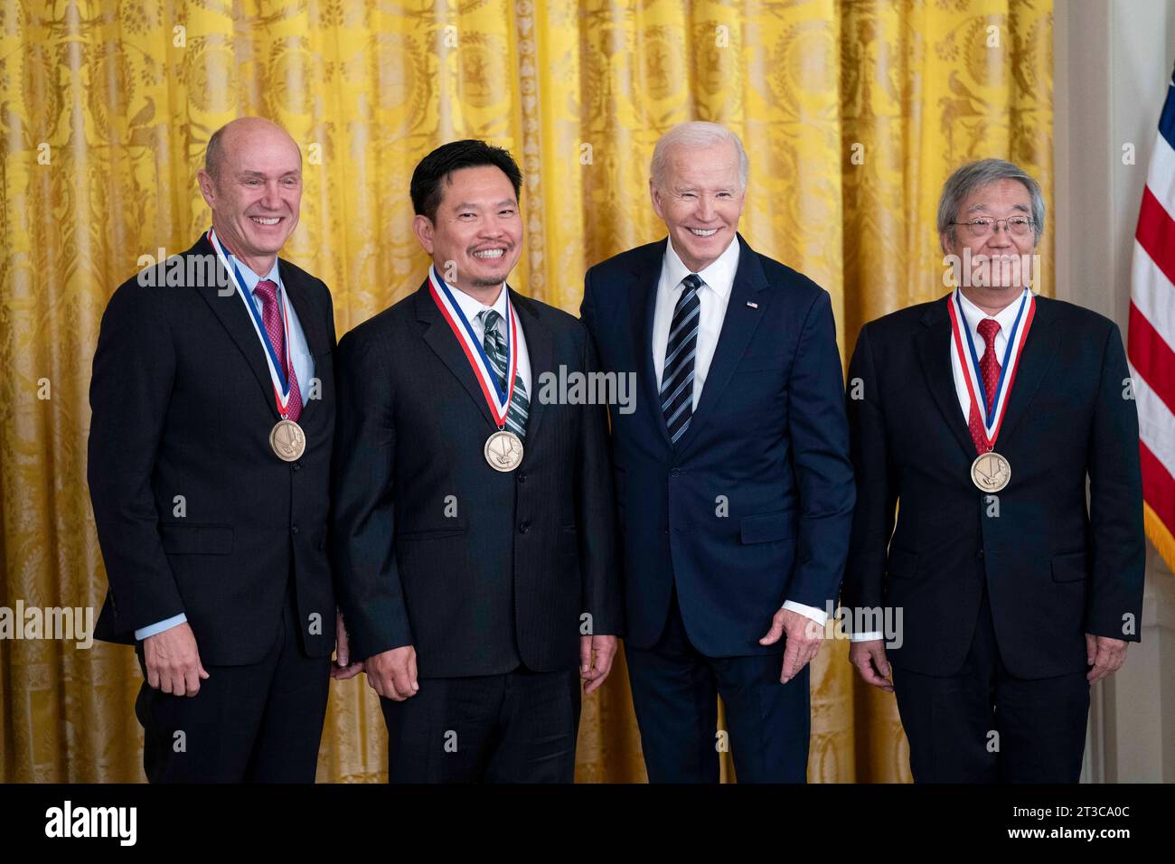 President Joe Biden awards Eric Swanson, David Huang, and James ...