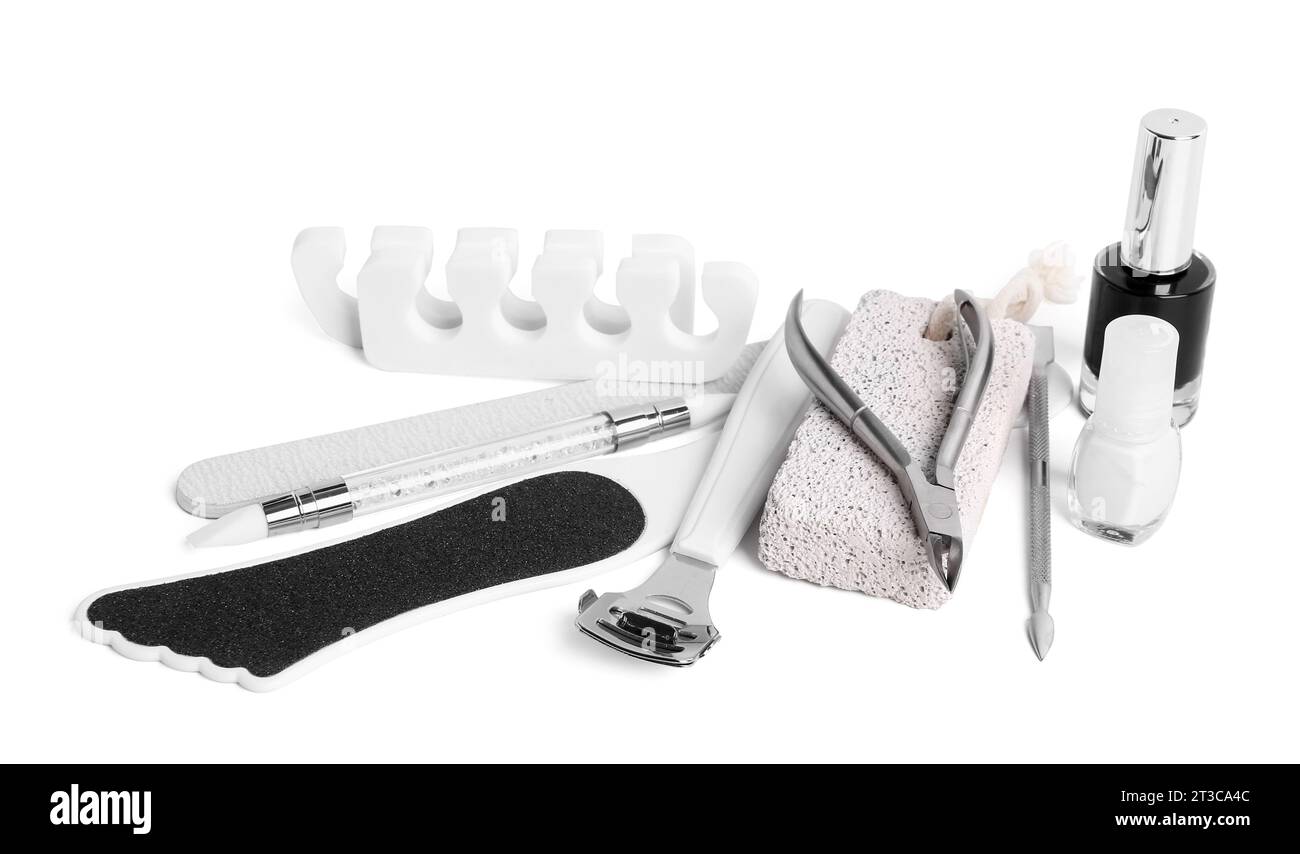 Set of professional tools for pedicure with nail polishes isolated on ...