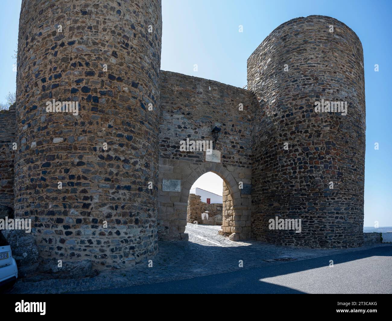 The main gate at the entrance to the historical walled village of ...