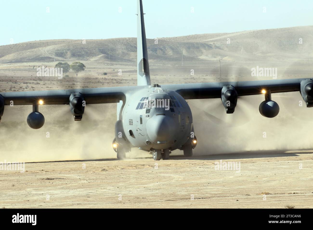 An Israeli Air Force C-130J Shimshon landing on a temporary dirt runway ...