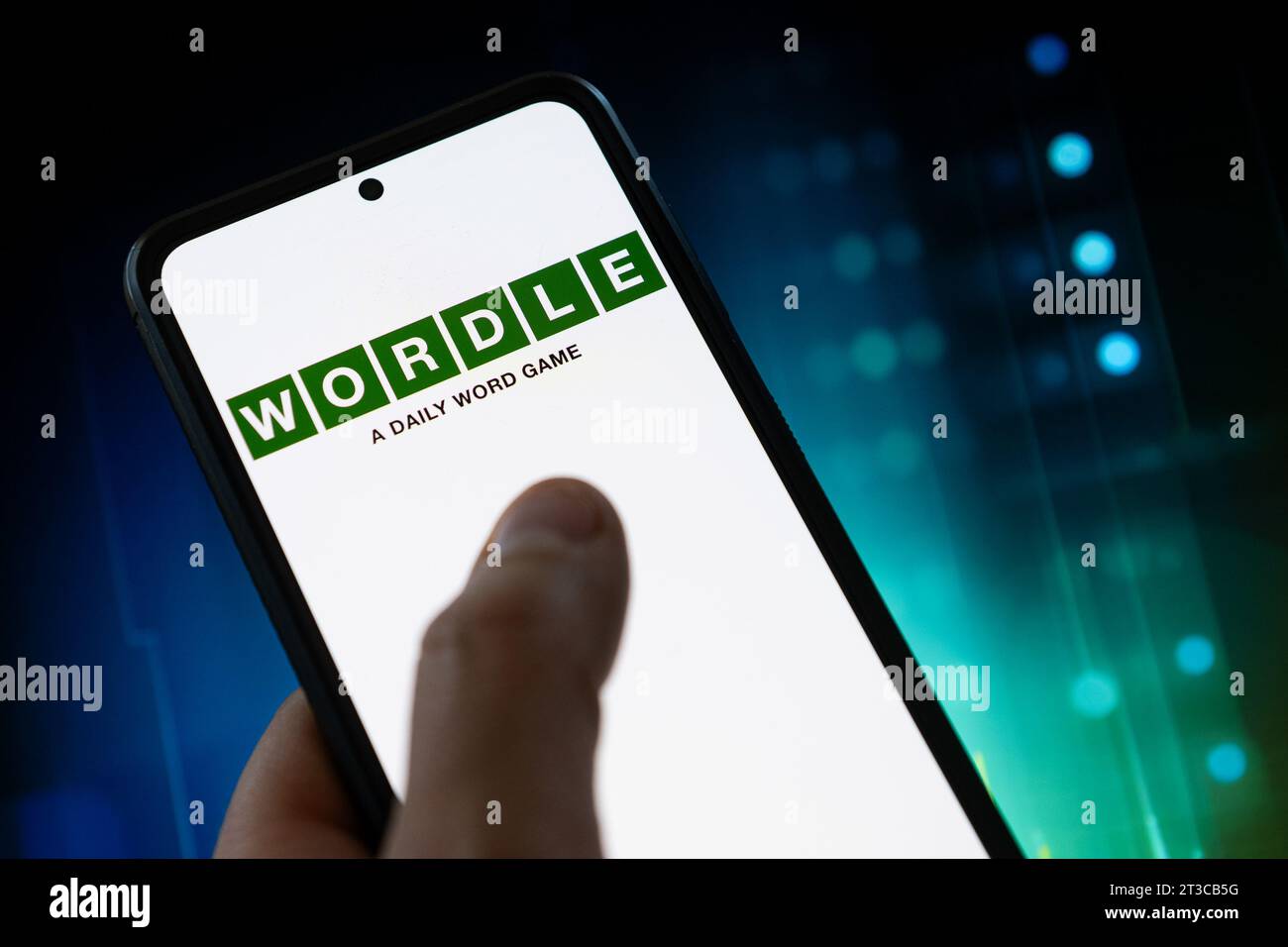 In this photo illustration a Wordle logo seen displayed on a smartphone ...