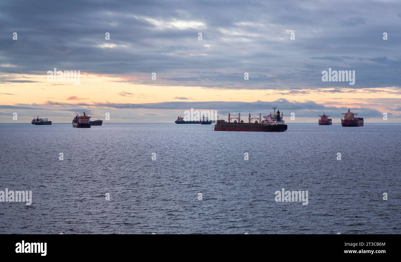Cargo ships at sea at dusk, Vancouver, British Columbia, Canada Stock ...