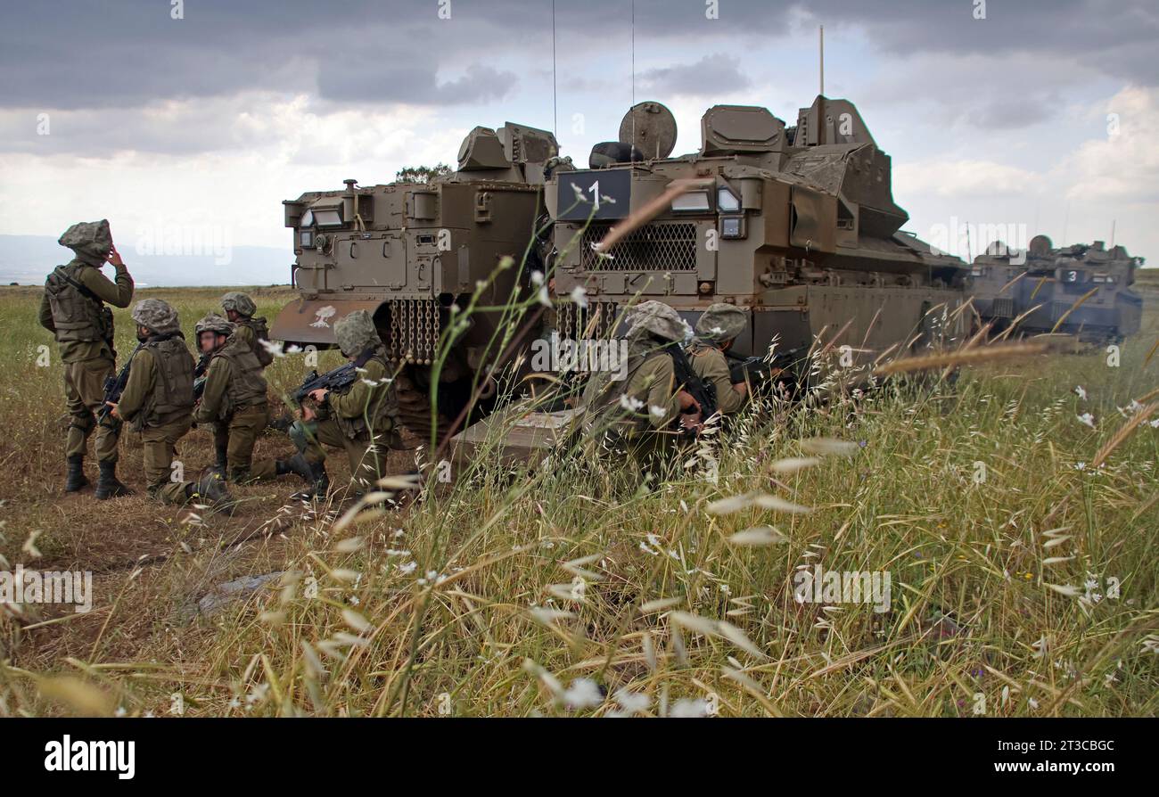 Infantry soldiers disembark from a Namer APC of the Israel Defense ...