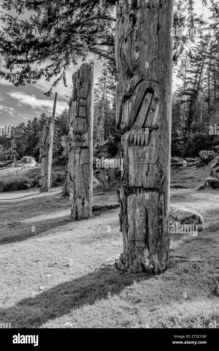 Totem poles at UNESCO World Heritage Site Sgang Gwaay Llnagaay, an ...