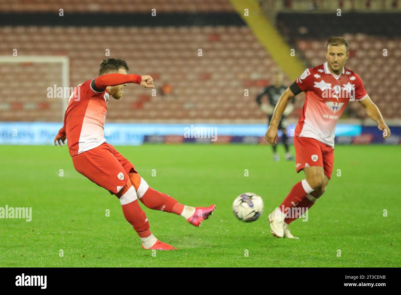 Nicky Cadden #7 of Barnsley takes a shot from a free kick during the ...