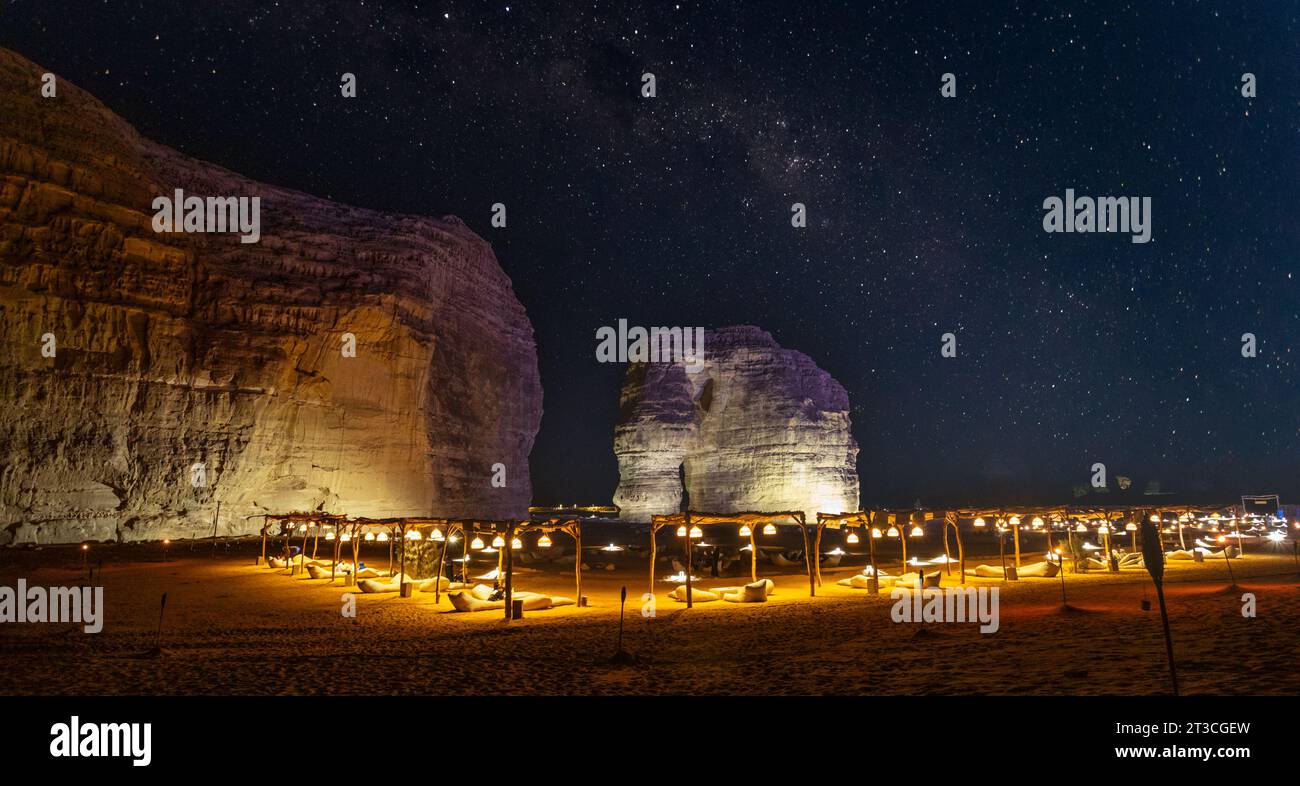 Illuminated outdoor lounge in front of elephant rock erosion monolith ...