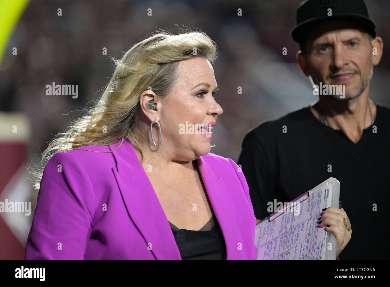 ESPN sideline reporter Holly Rowe walks behind the end zone during the ...