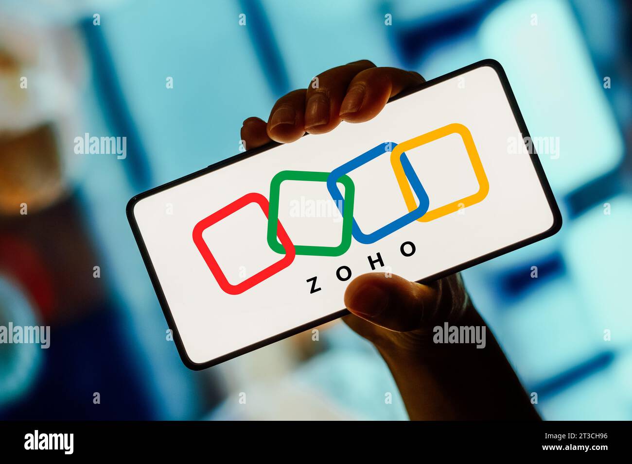 In this photo illustration, the Zoho logo is displayed on a smartphone ...
