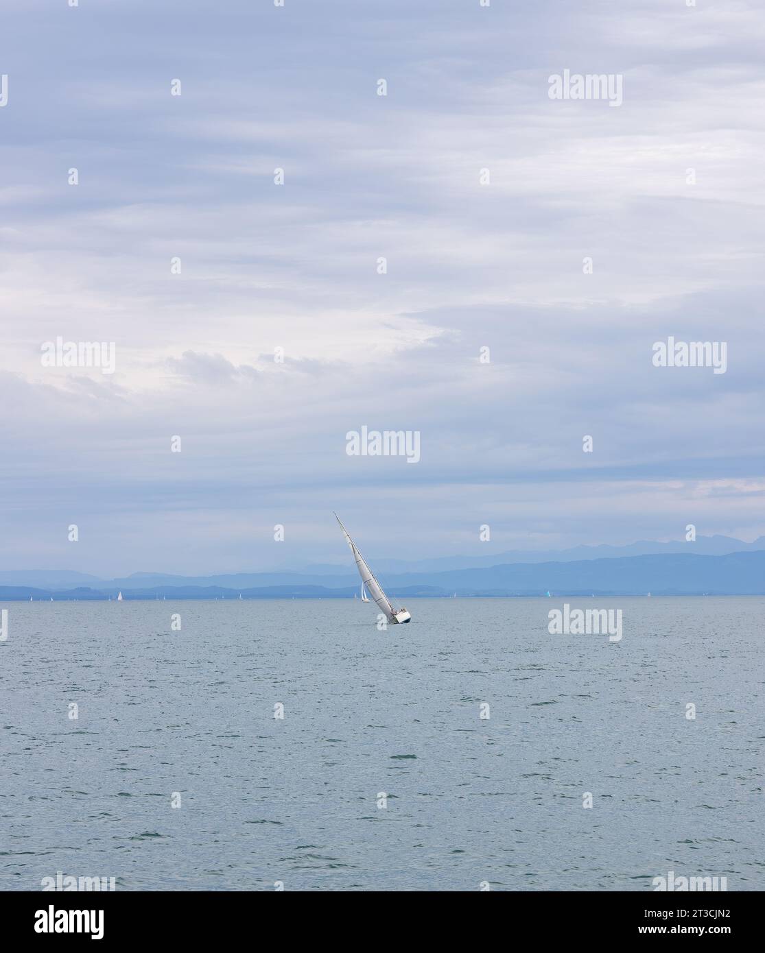 Lake Constance with a tilted sailing boat at full speed Stock Photo - Alamy