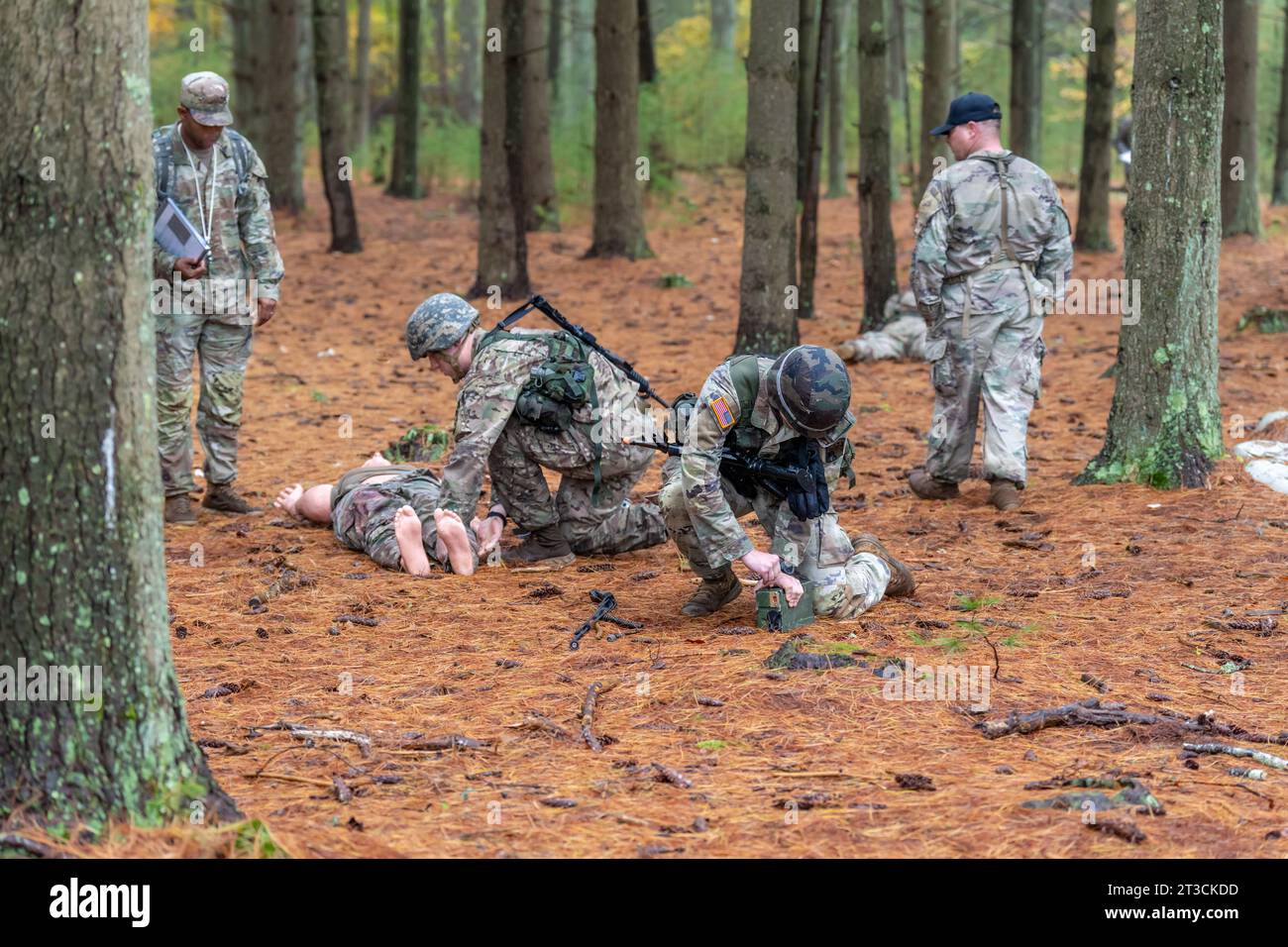 Unidentified Instructors observing multiple Army soldiers training for ...