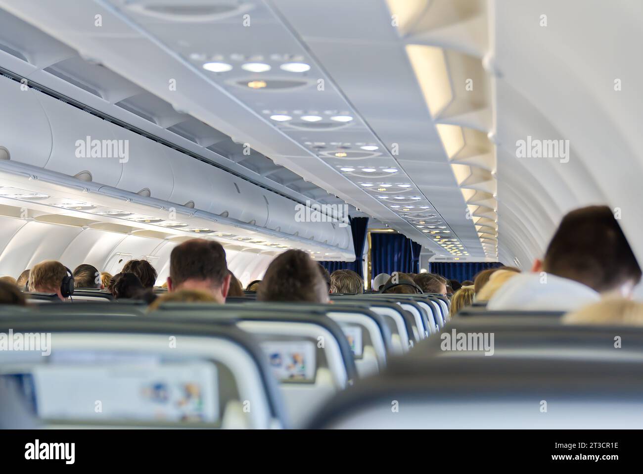 Interior of Airplane Cabin with Passengers Boarding or Deboarding at ...