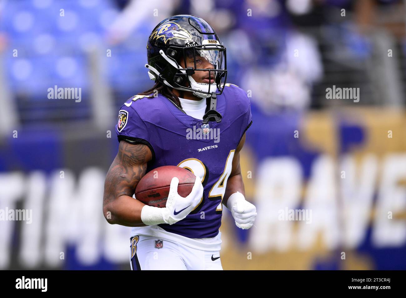 Baltimore Ravens running back Keaton Mitchell (34) works out before an ...