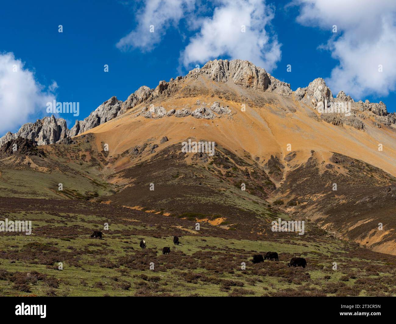 Rugged mountains and mountain ranges, rocks and barren expanses of red ...