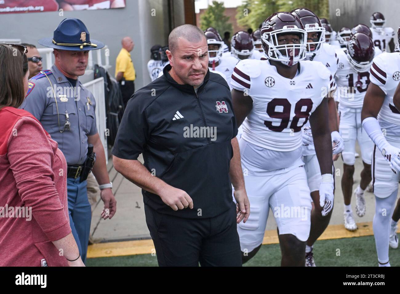 Mississippi State coach Zach Arnett walks onto the field with his team ...