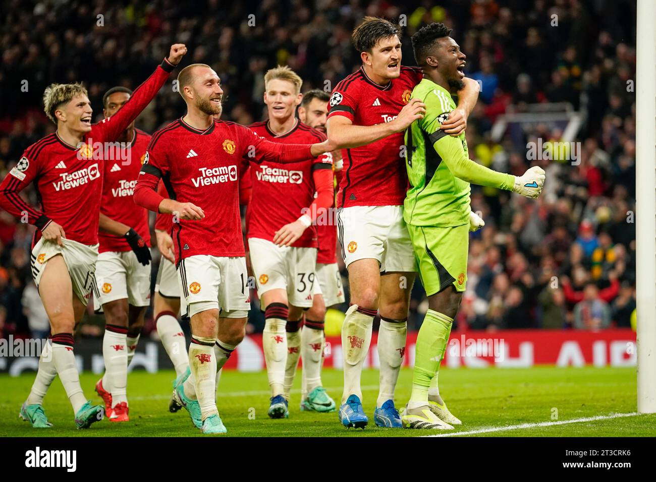 Manchester United's goalkeeper Andre Onana, right, celebrates with ...