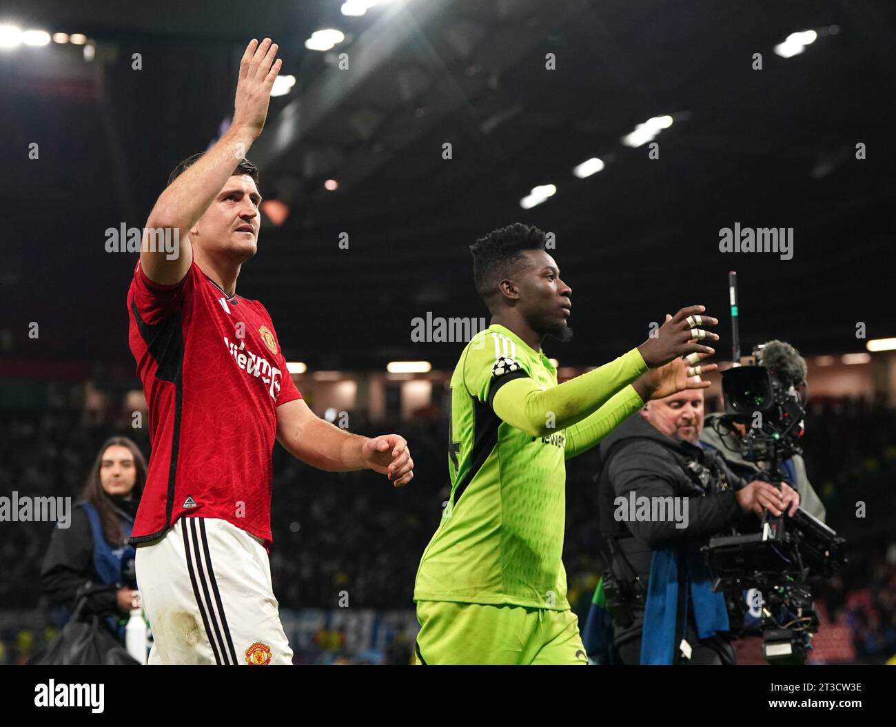 Manchester United's Harry Maguire (left) and oalkeeper Andre Onana ...