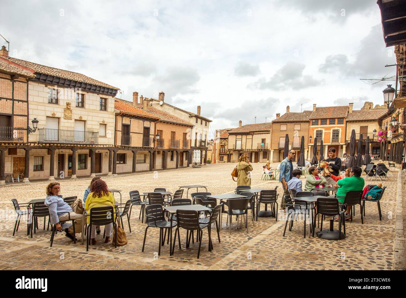 People outside in the Plaza mayor in the Spanish city of Saldana North ...