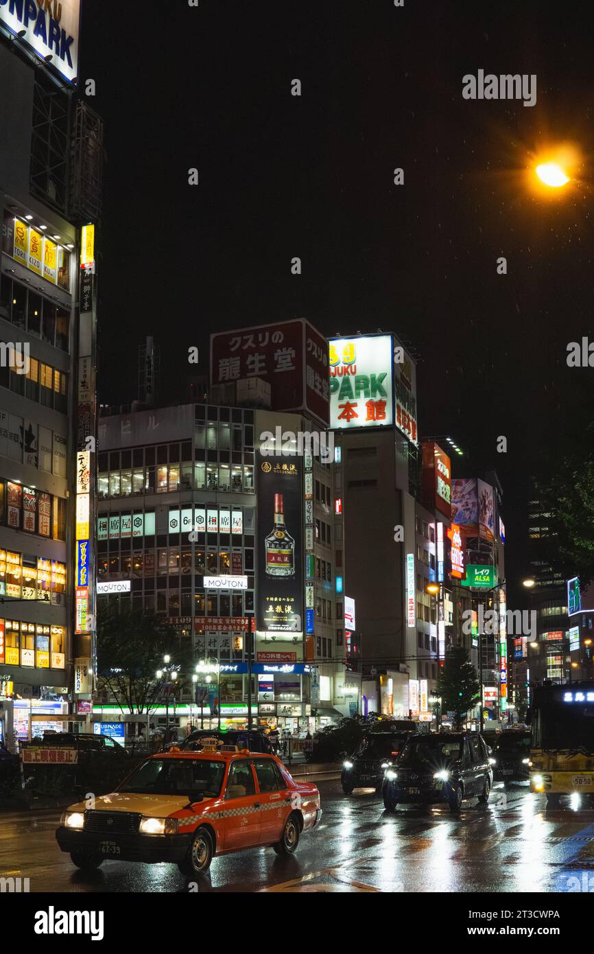 Crowded street at night in Tokyo Stock Photo - Alamy