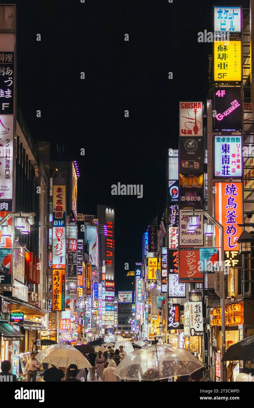 Crowded street at night in Tokyo Stock Photo - Alamy