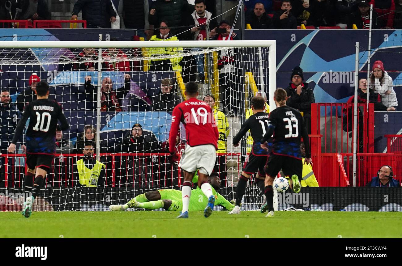 Manchester United goalkeeper Andre Onana saves a penalty from FC ...