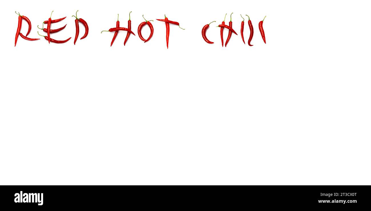 Red chilli peppers arranged to spell out RED HOT CHILI . The chillies ...