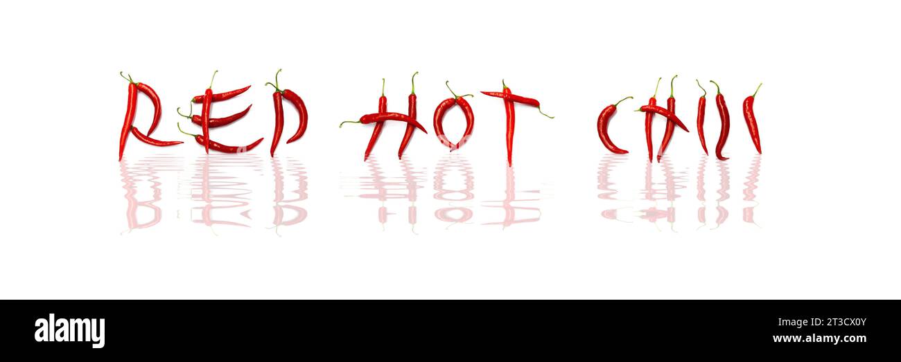 Red chilli peppers arranged to spell out RED HOT CHILI . The chillies ...