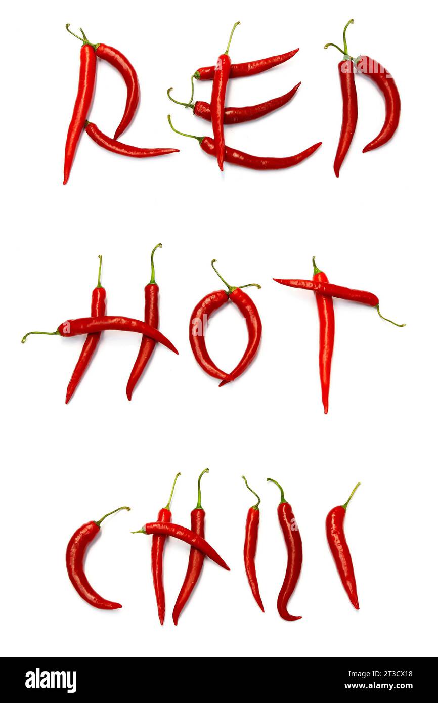 Red chilli peppers arranged to spell out RED HOT CHILI . The chillies ...