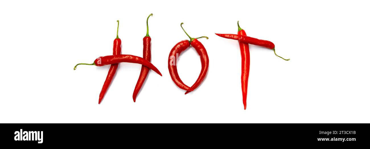 Red chilli peppers arranged to spell out RED HOT CHILI . The chillies ...