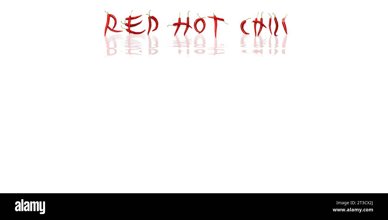 Red chilli peppers arranged to spell out RED HOT CHILI . The chillies ...