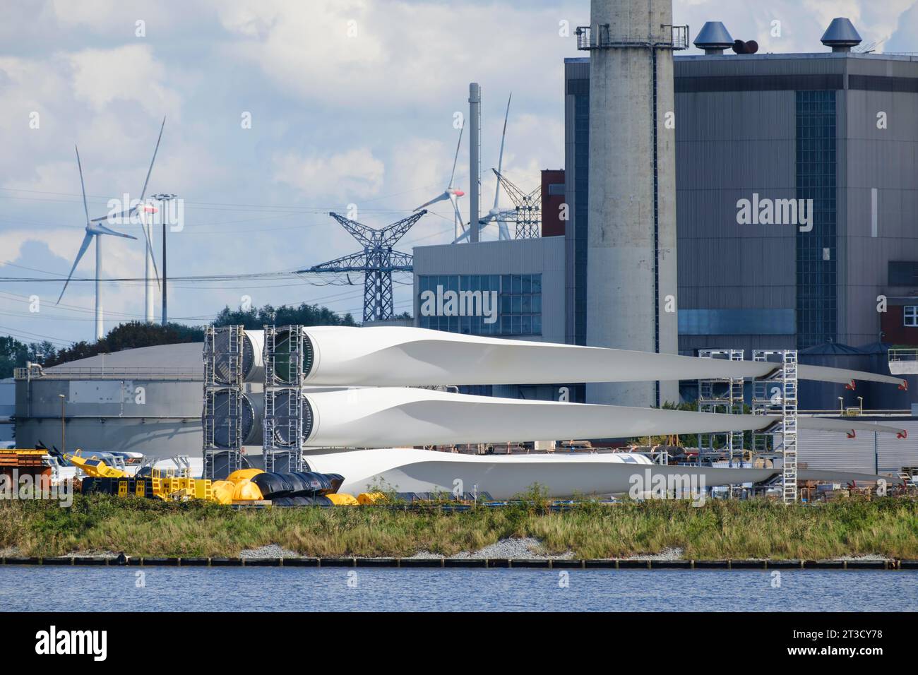 Rotor blades for wind turbines lie in the industrial harbour, Emden ...