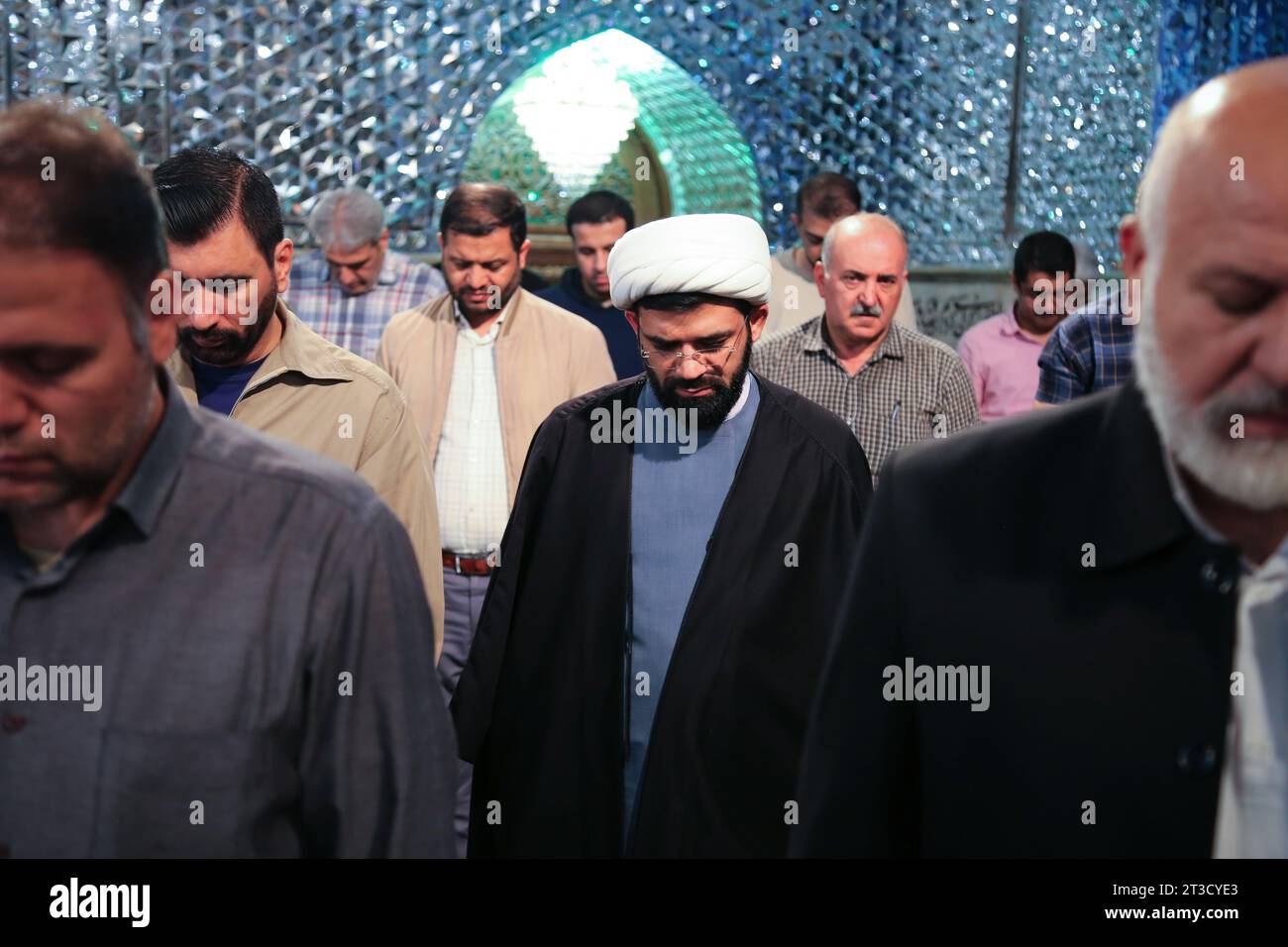 Tehran, Iran. 24th Oct, 2023. Iranian men pray during a prayer ceremony ...