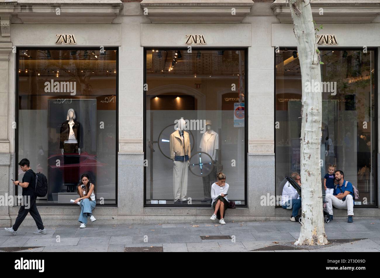 Shoppers are seen in front of the Spanish multinational clothing design ...