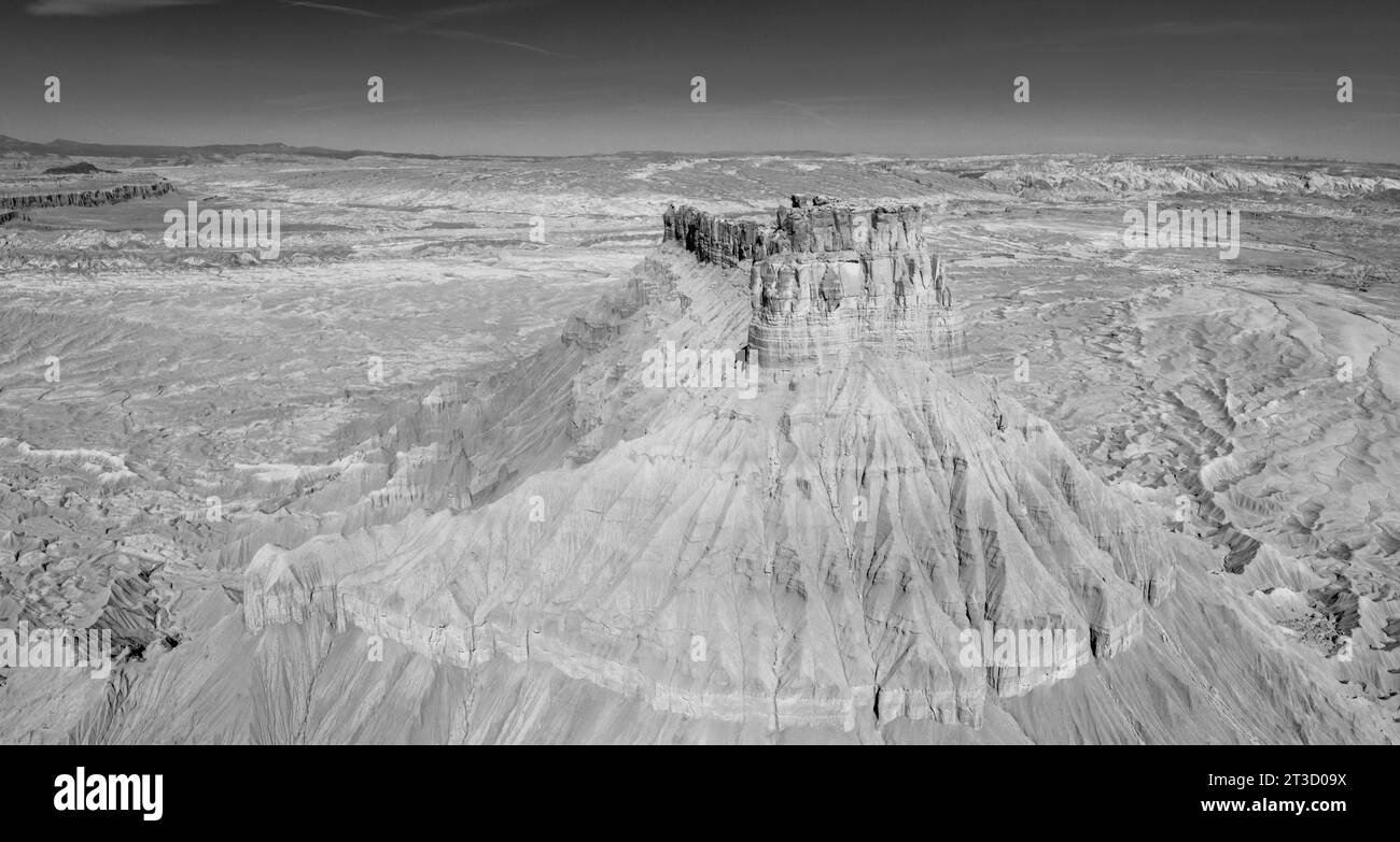 Aerial panoramic photograph of Factory Butte, an eroded, solitary mesa ...