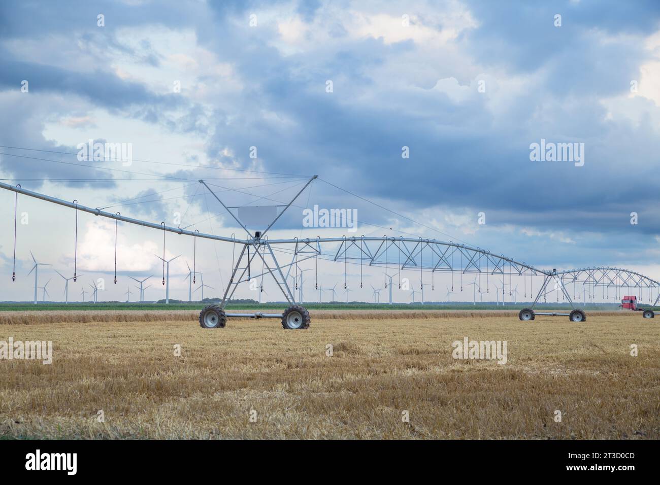 irrigation system with wind turbine in the farmland in Netherlands ...