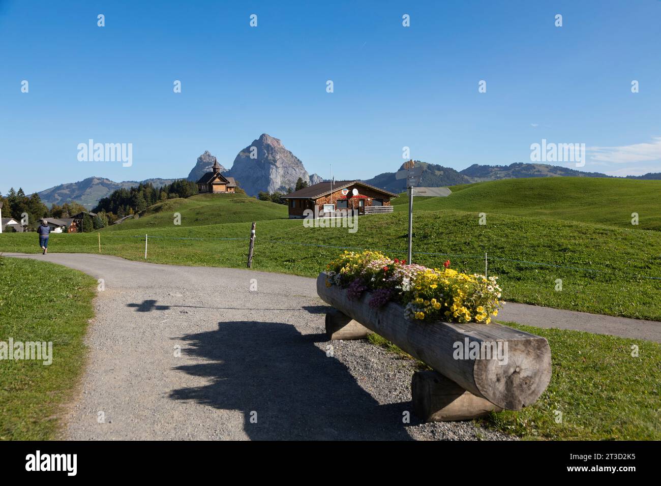 Church and school on the Alpine village of Stoos and the Mountains ...