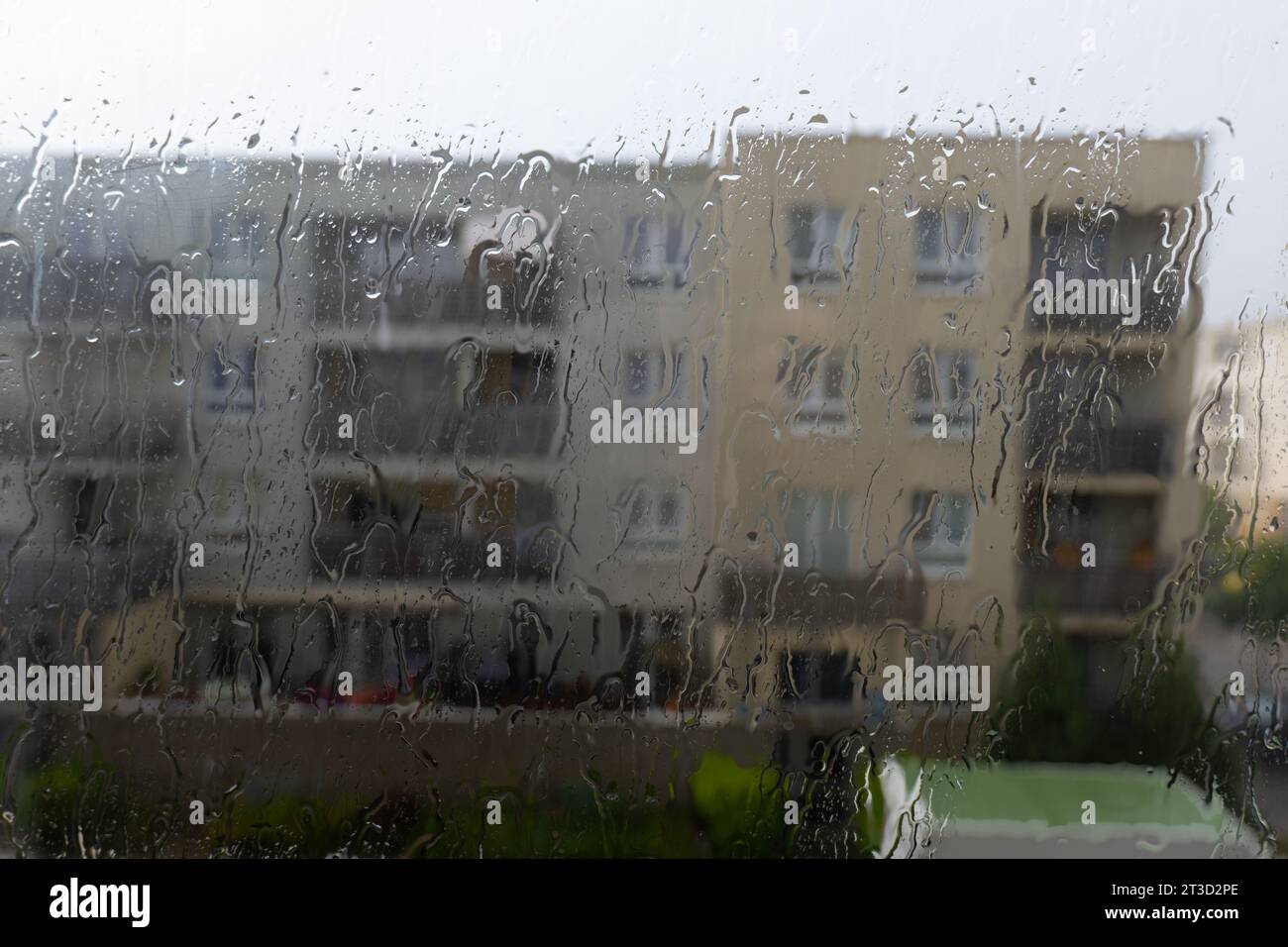 Rain on the glass in the window of the house Stock Photo - Alamy