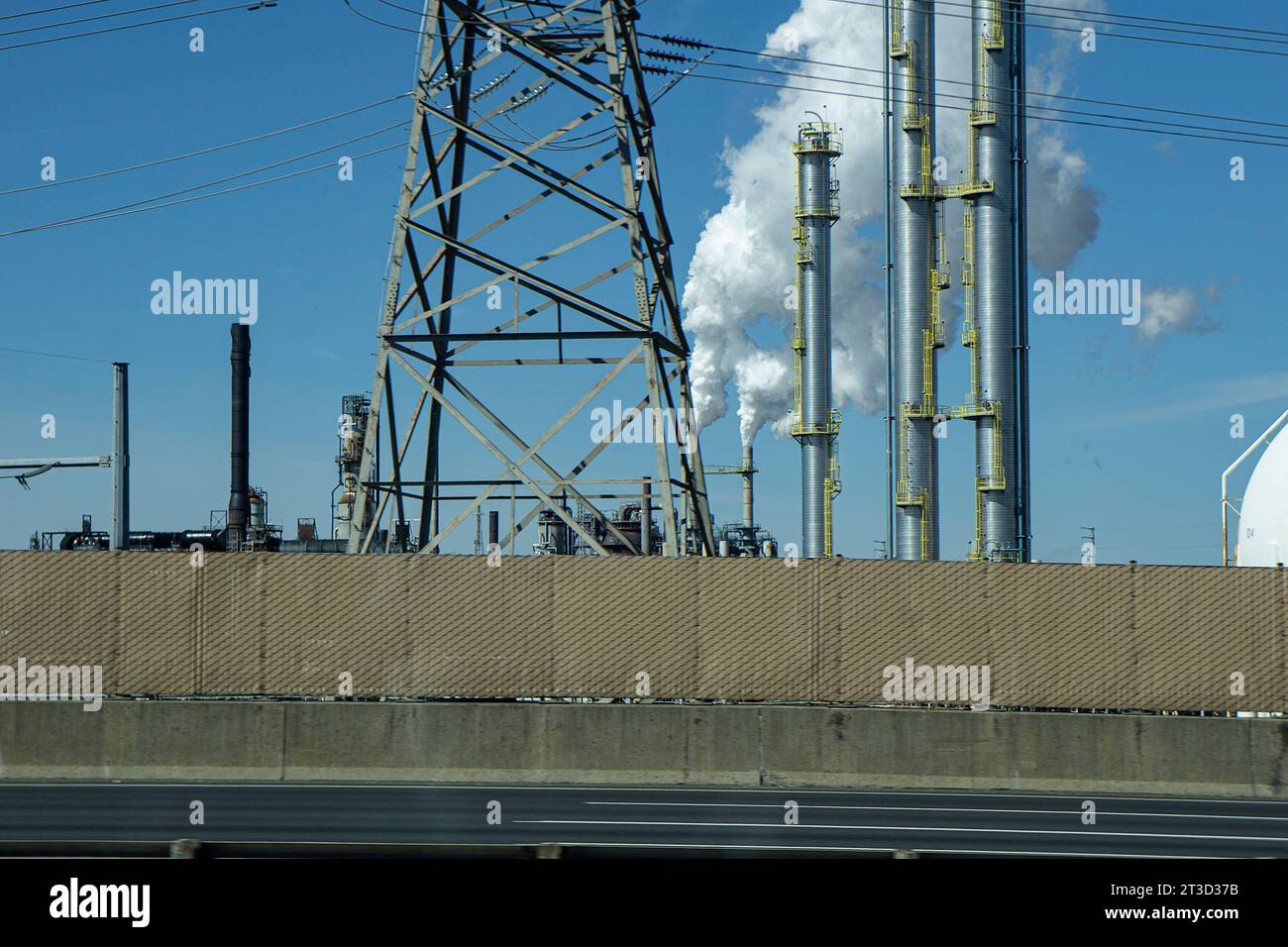 Industrial smoke stacks along highway, New Jersey, USA Stock Photo - Alamy