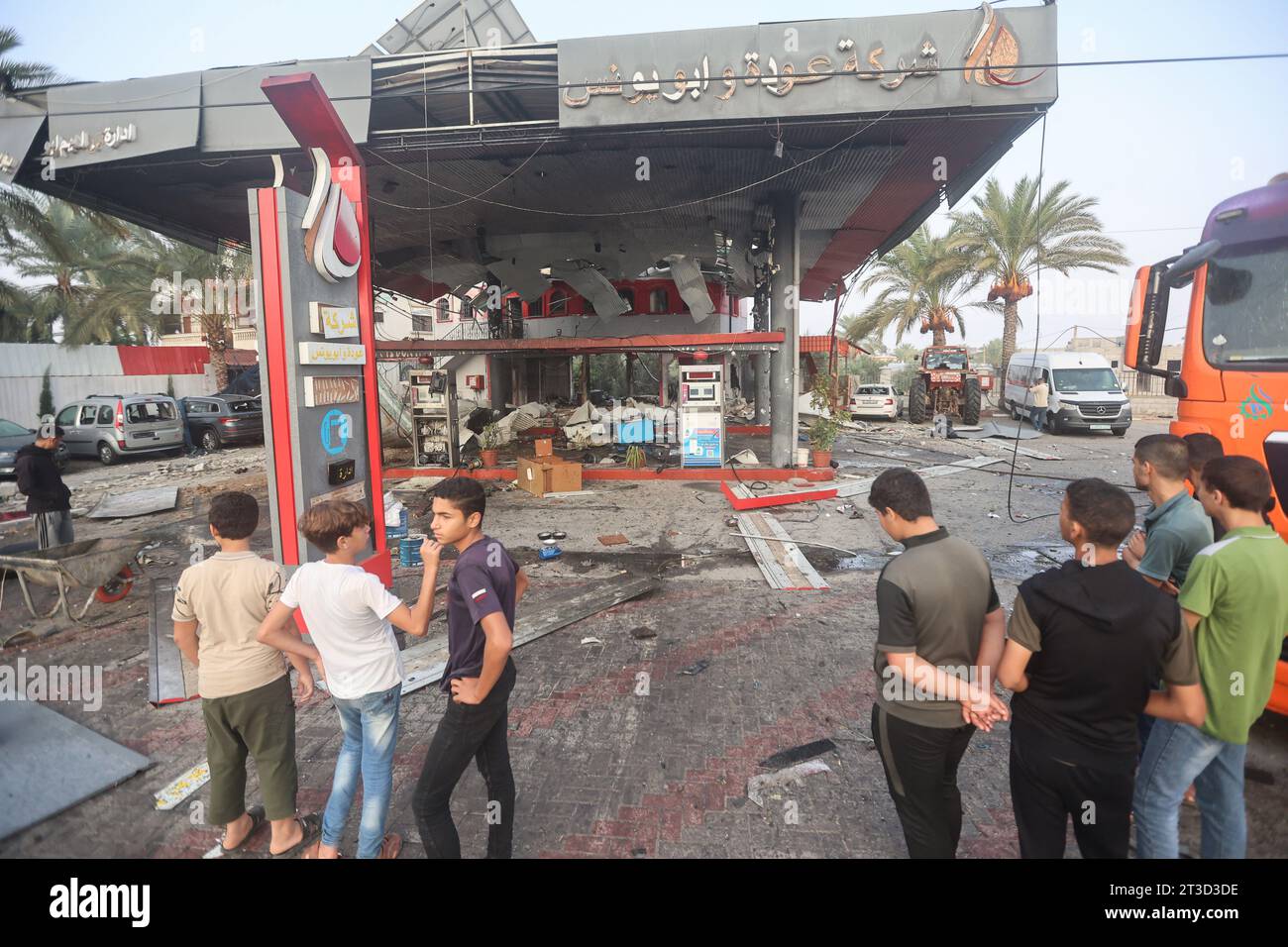Gaza, Palestine. 24th Oct, 2023. Palestinians stand in front of the ...