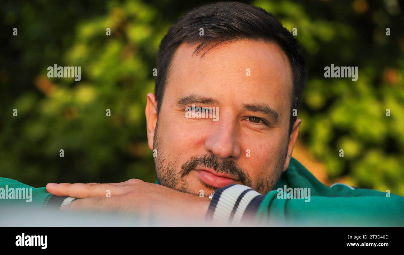 Handsome smiling unshaven young hi-res stock photography and images - Alamy